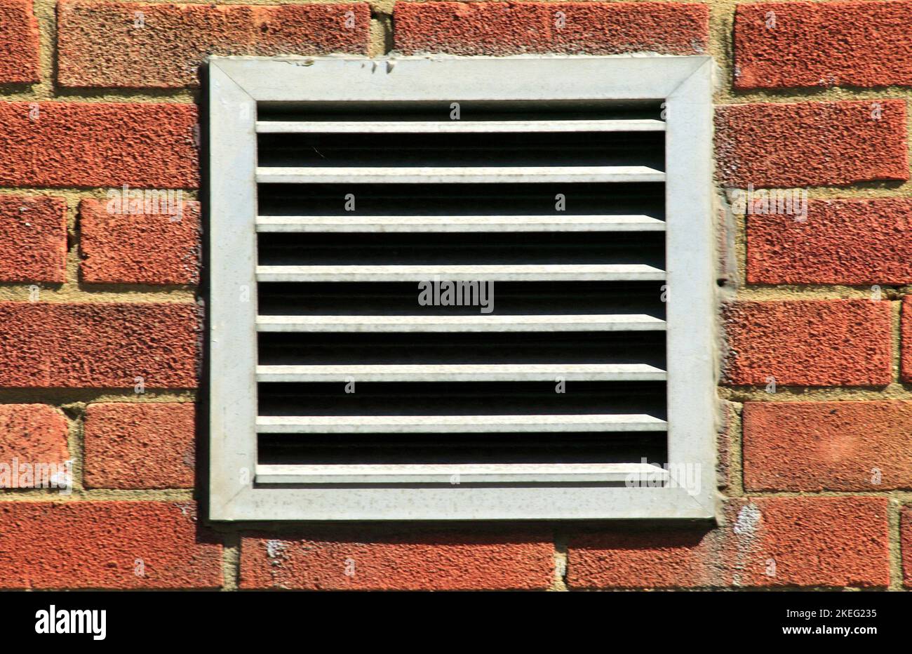 Modern new air vent cemented into a brick wall of a house, stock photo ...