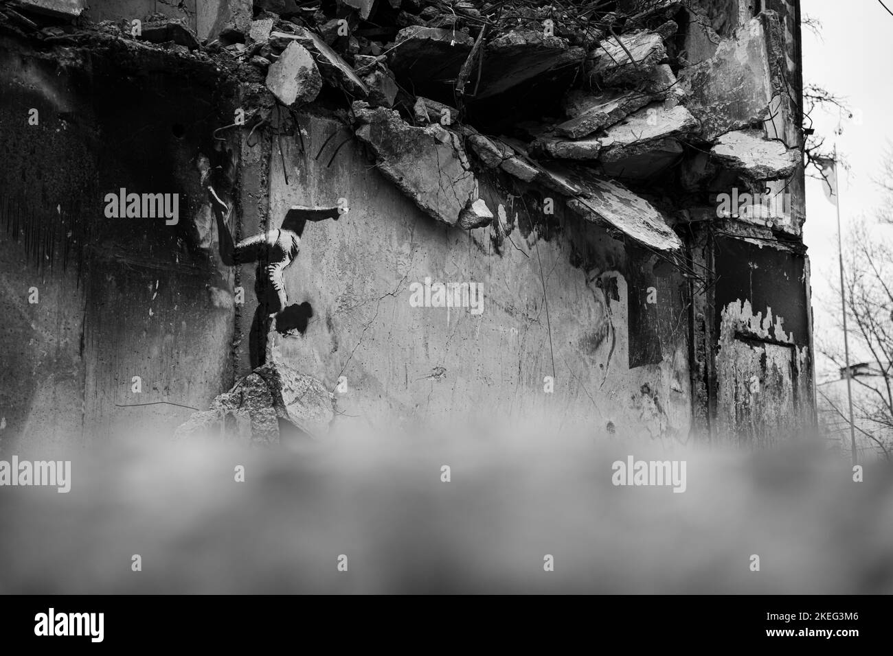 Borodyanka, Kyiv region 11.12.2022 The work of the mural of Banksy on ...