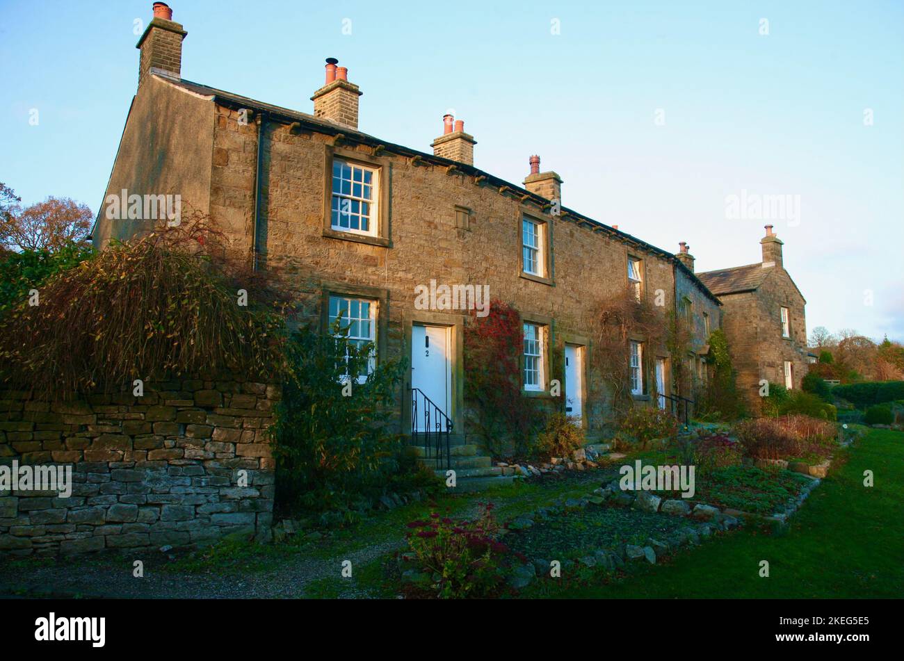 A view of the pretty cottages in the village of Downham, Clitheroe ...