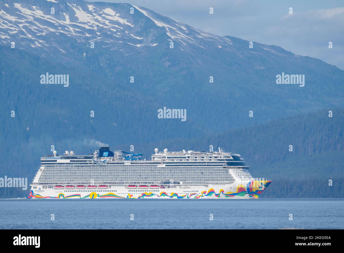 USA, Alaska. Norwegian Cruise Lines ship, Norwegian Encore, sailing in ...