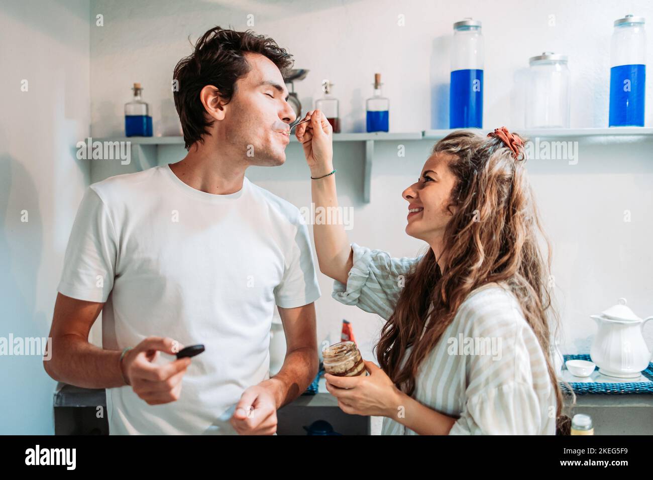 Boyfriend feeding girlfriend hi-res stock photography and images - Alamy