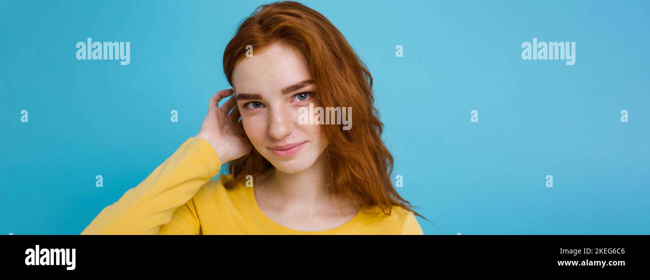 Headshot Portrait of happy ginger red hair girl with freckles smiling ...