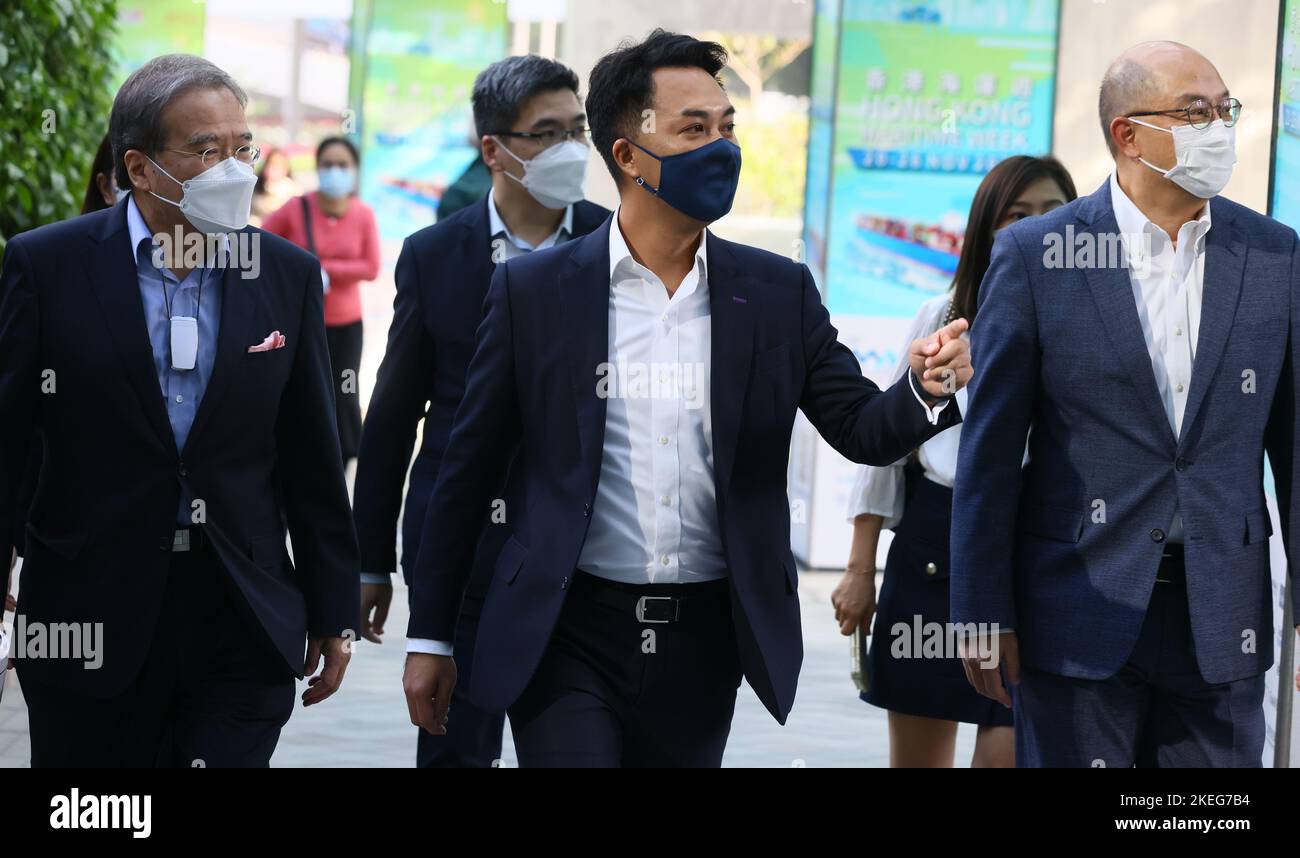 Flanked by Anthony Wu Ting-yuk (L) and Raymond Tam Chai-yuen, Gary WONG ...