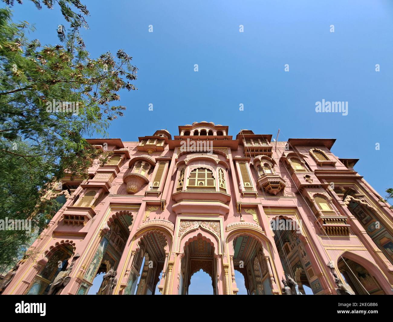 A low-angle shot of the spectacular Patrika Gate against a clear blue ...