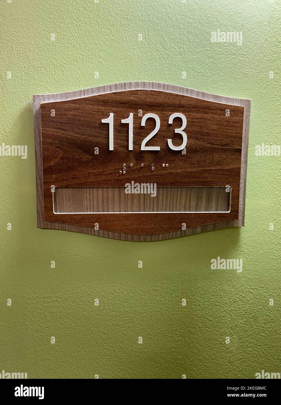 1123 on Apartment Door Plaque including Braille Numbers Stock Photo - Alamy