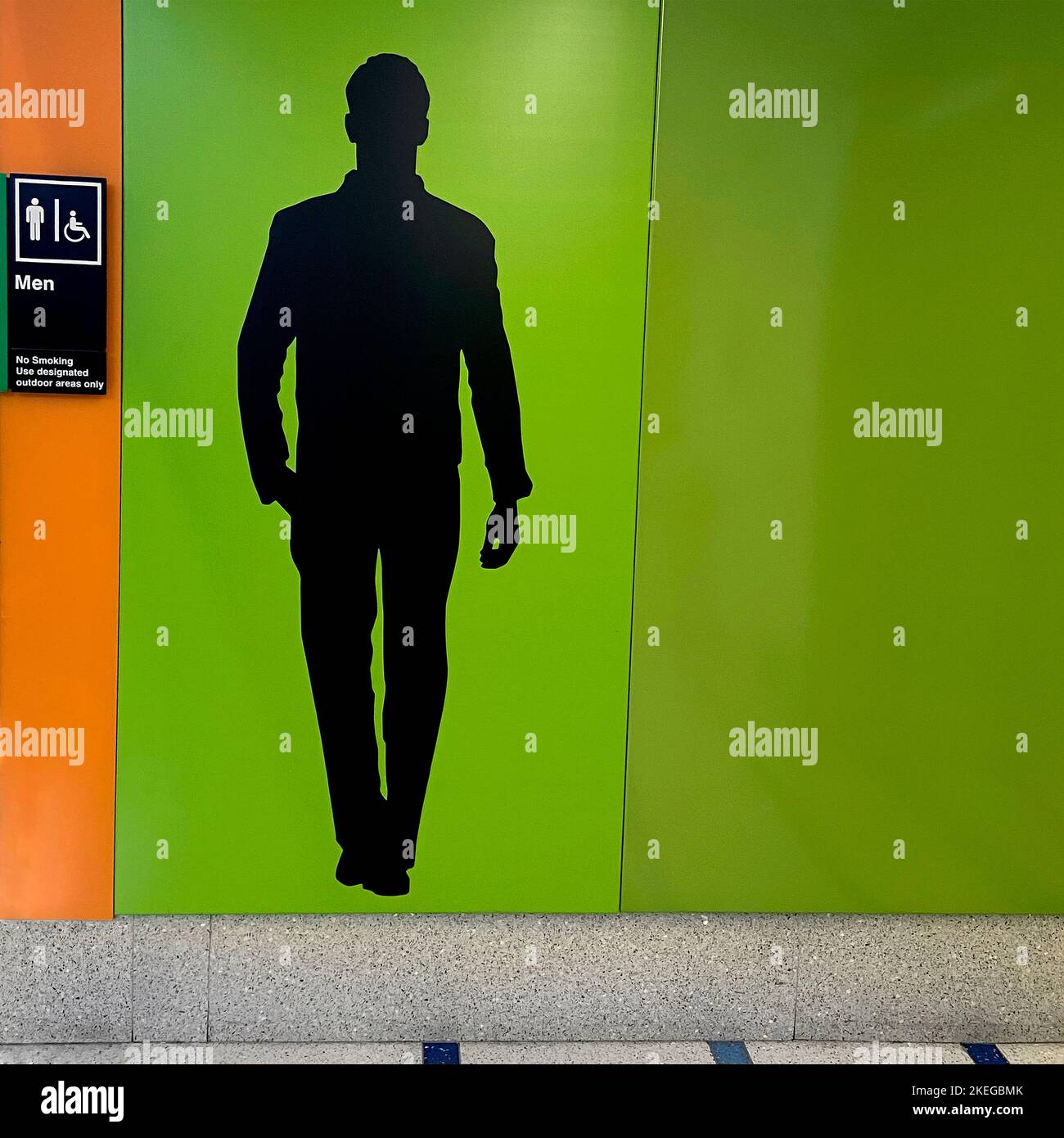 Silhouette of Male Human Figure on Wall outside Men's Bathroom Stock ...