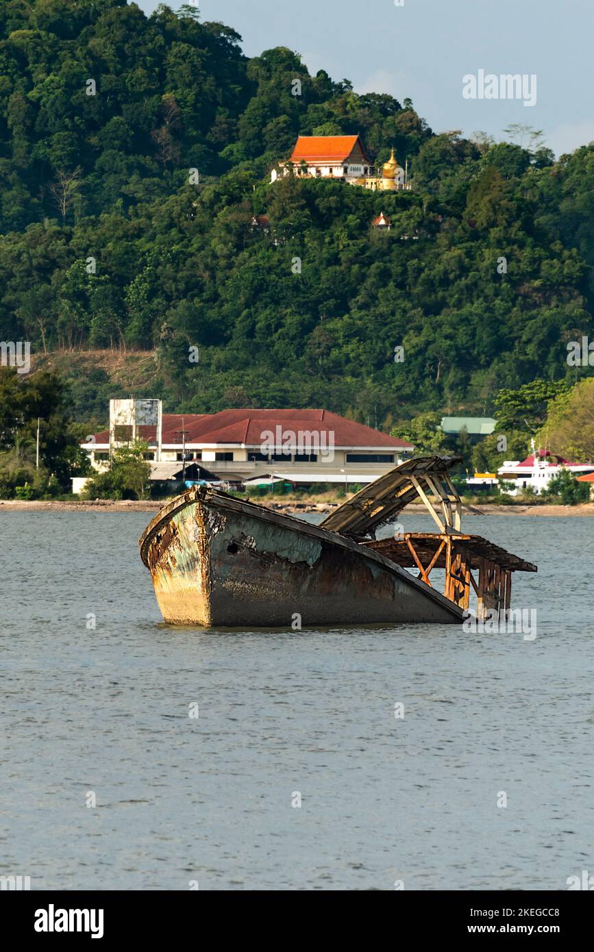 An old boat floating in water Stock Photo - Alamy