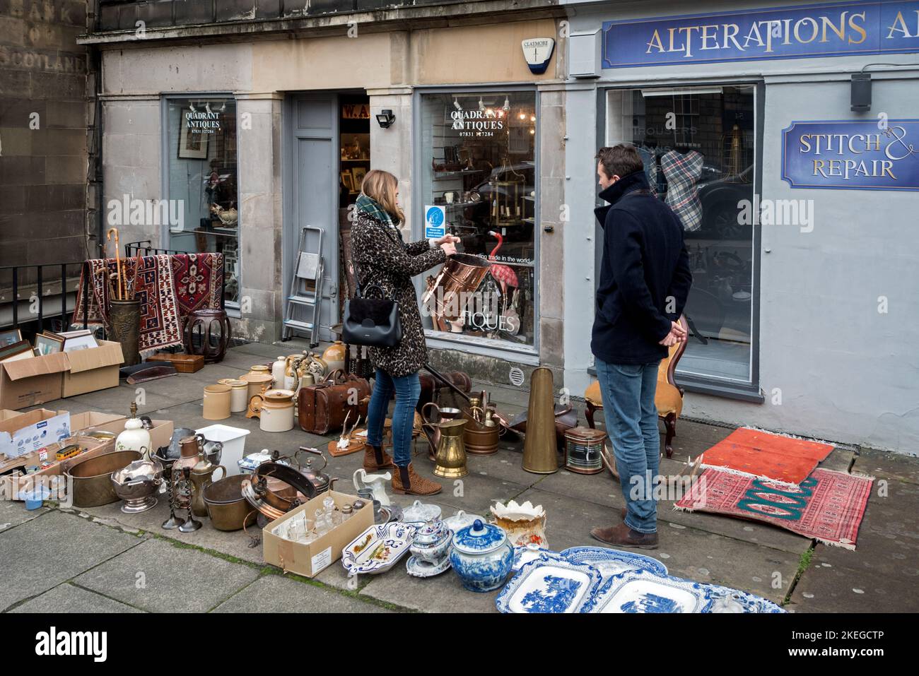 Young couple browsing outside an antique shop on Dundas Street in ...