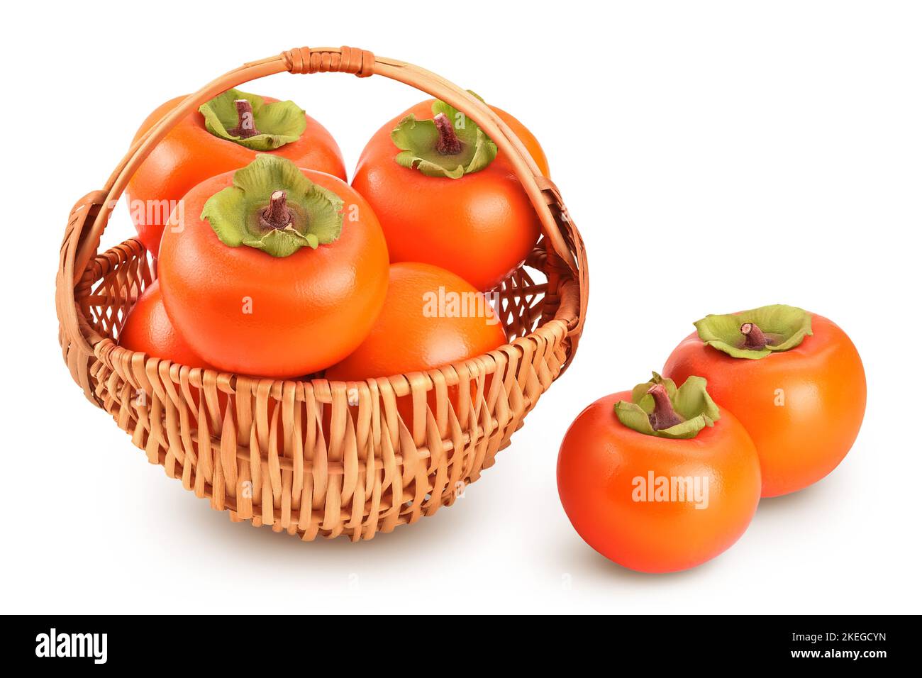 Persimmon fruit in wicker basket isolated on white background with full ...