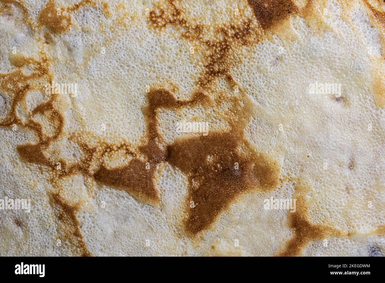 Pancake surface texture and pattern. Close-up of thin hot pancakes in a ...
