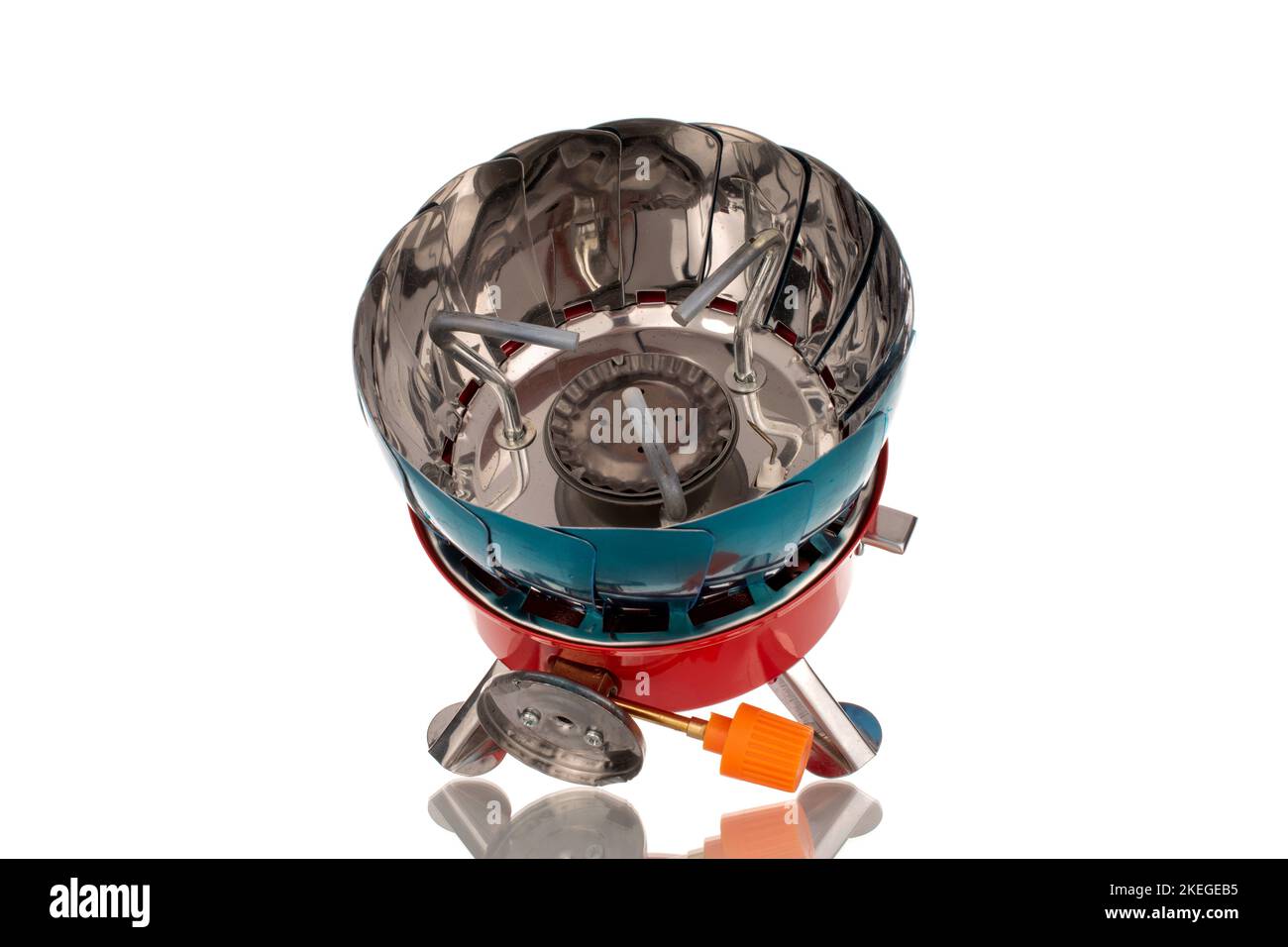 One compact windproof travel gas stove, macro, isolated on white ...