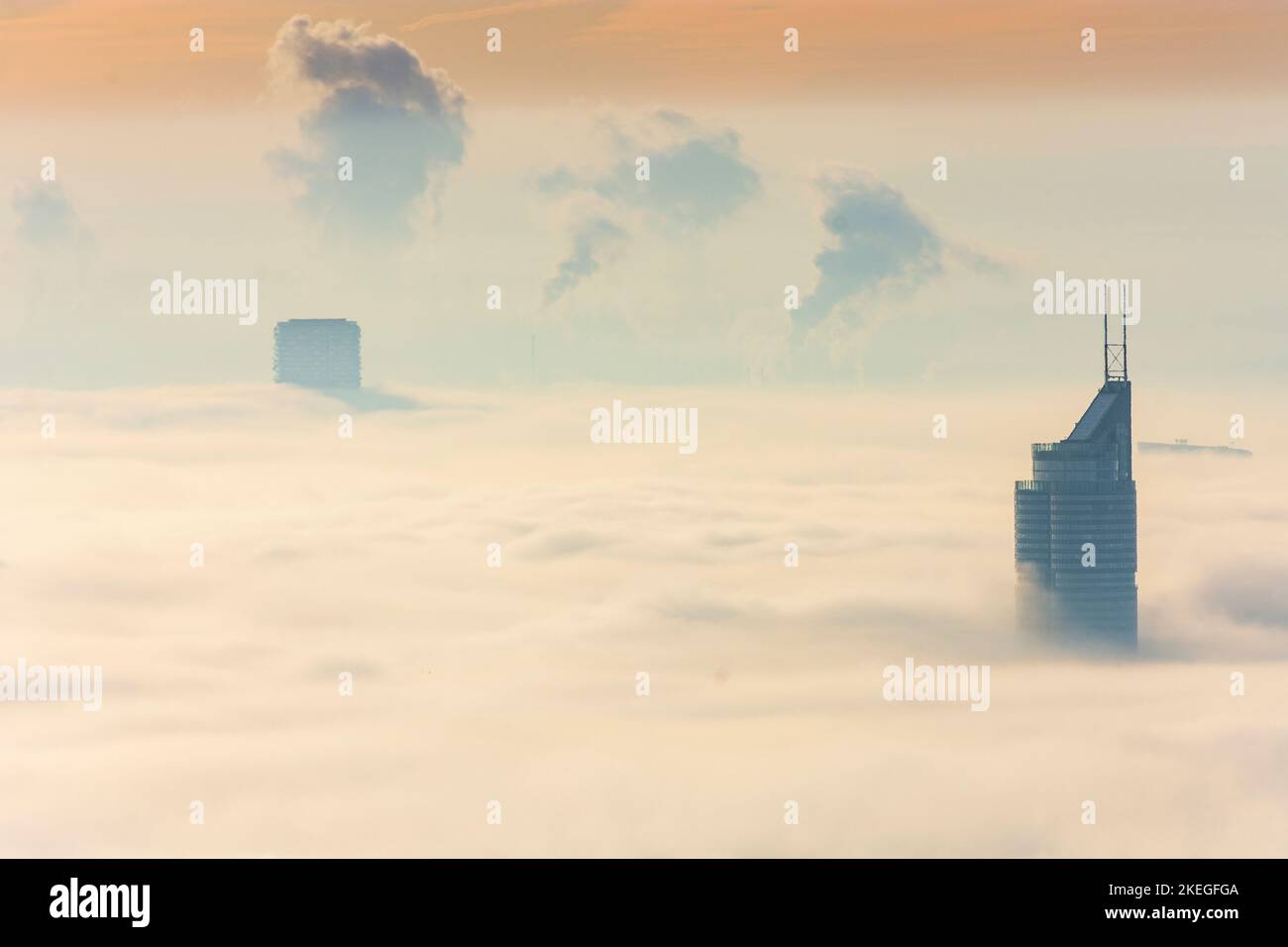 Skyscrapers stick out from ground fog hi-res stock photography and ...
