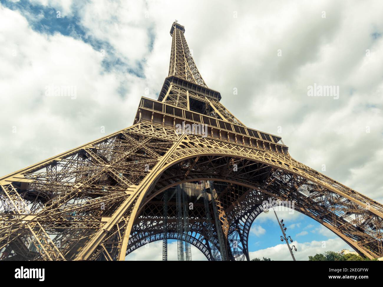 Eiffel Tower bottom view, Paris, France. Photo of openwork construction on sky background ...