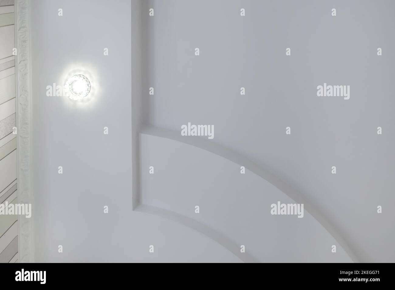 Detail of corner ceiling with intricate crown molding. Suspended ...