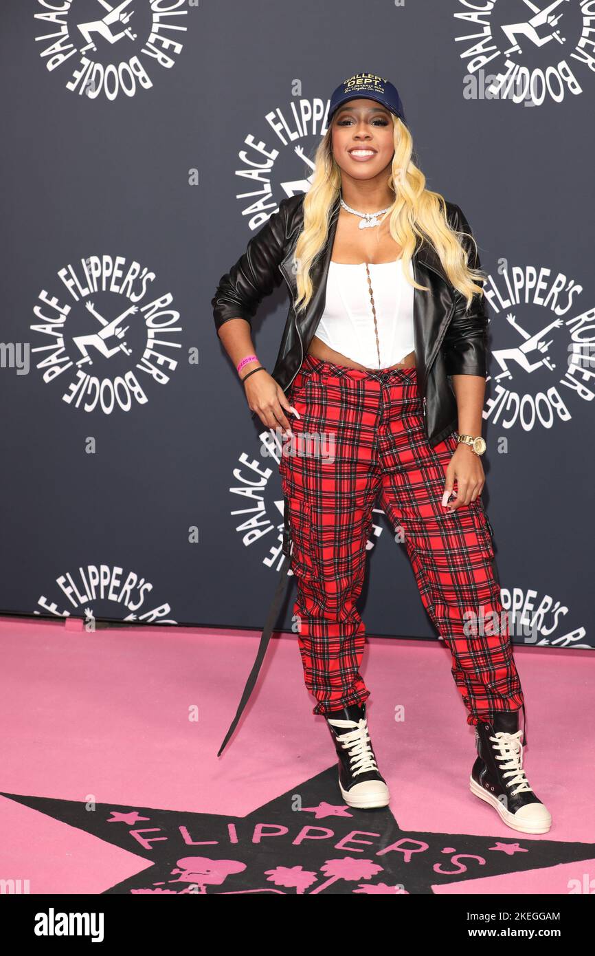 Guests attend the Opening of Flipper's Roller Boogie Palace in London ...