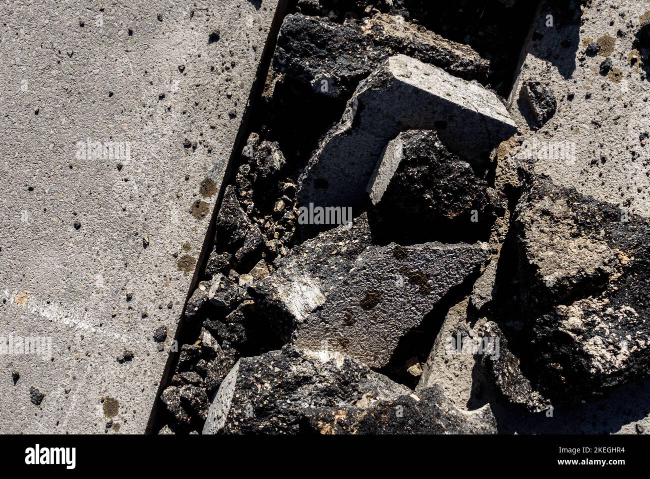 Broken asphalt blocks in a ditch in street repairs Stock Photo - Alamy