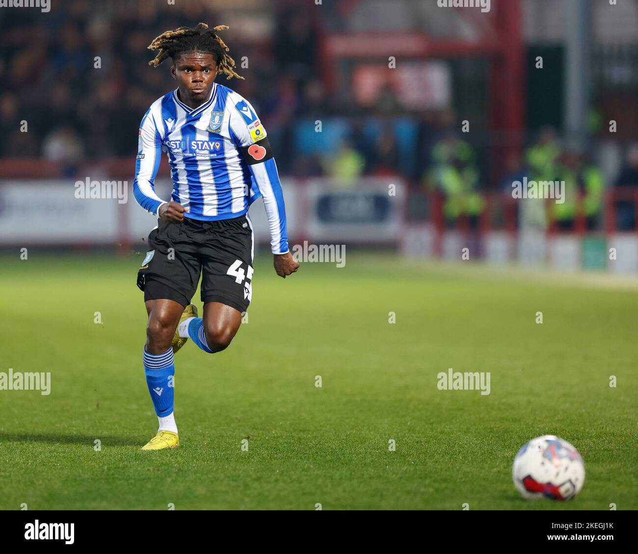Alex Mighten #45 of Sheffield Wednesday chases the ball during the Sky ...