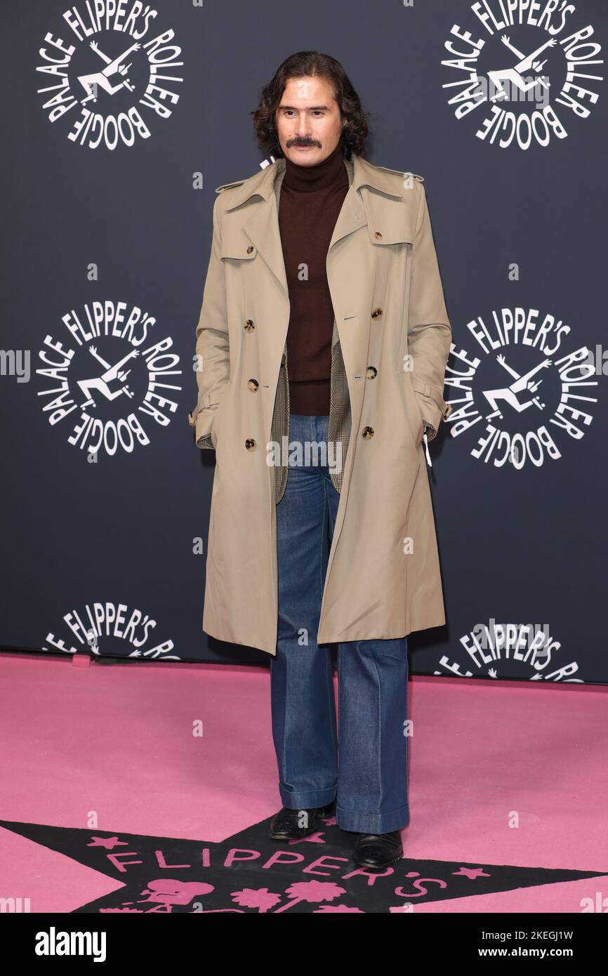 Ben Cobb attends the opening of Flipper's Roller Boogie Palace in ...