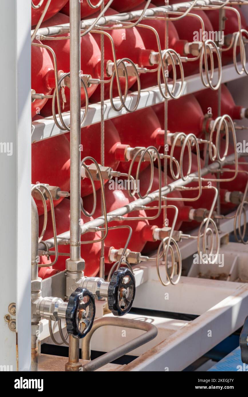 Metal bottles joined by tubes used for the transport of hydrogen, H2 ...