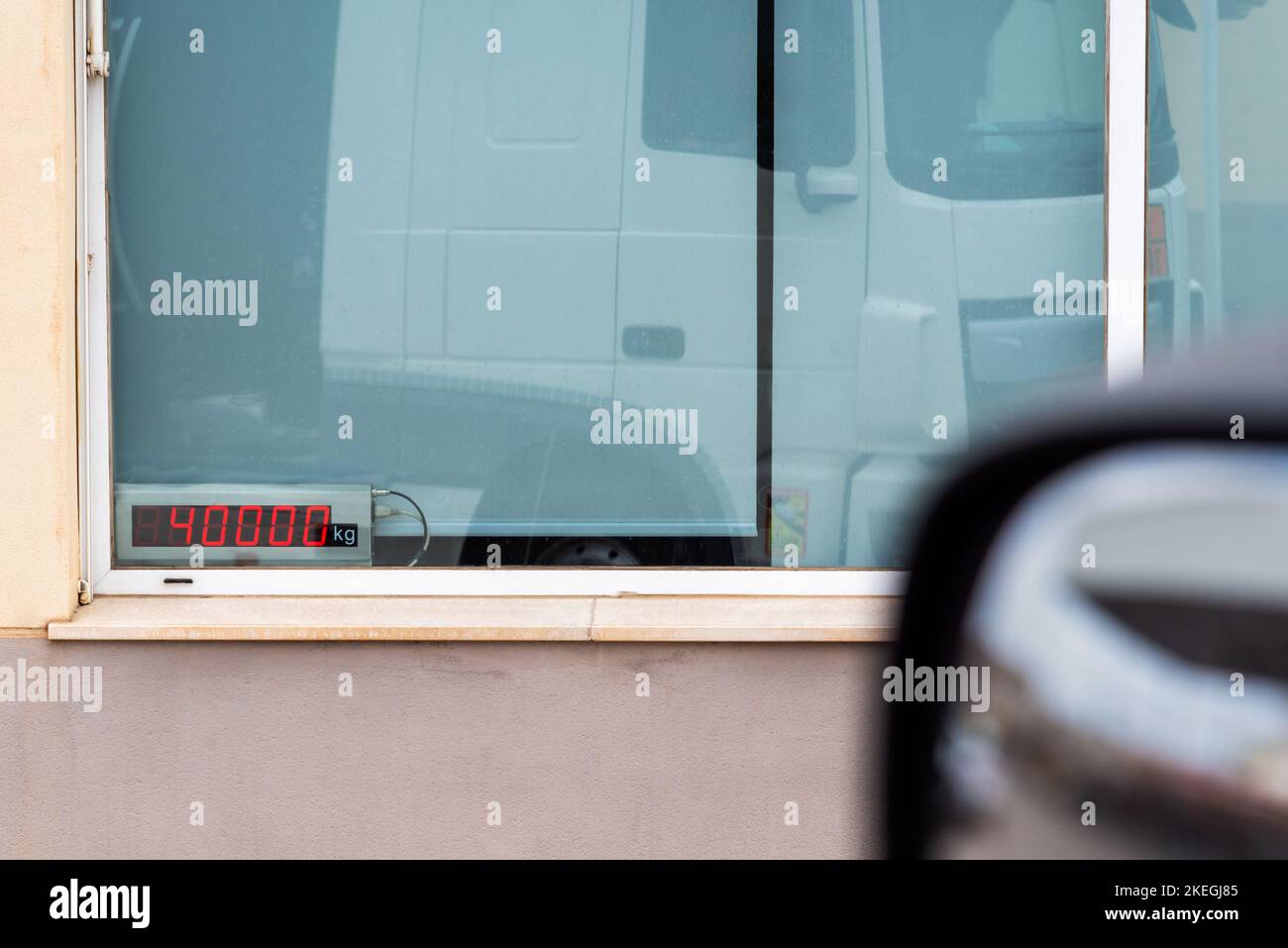 Screen of a scale for trucks indicating 40,000 kilograms of weight, the ...