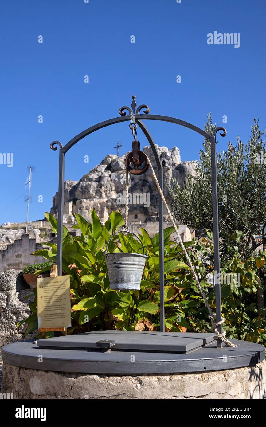 MATERA, ITALY - OCTOBER 17, 2022: Old public well in the old town Stock ...