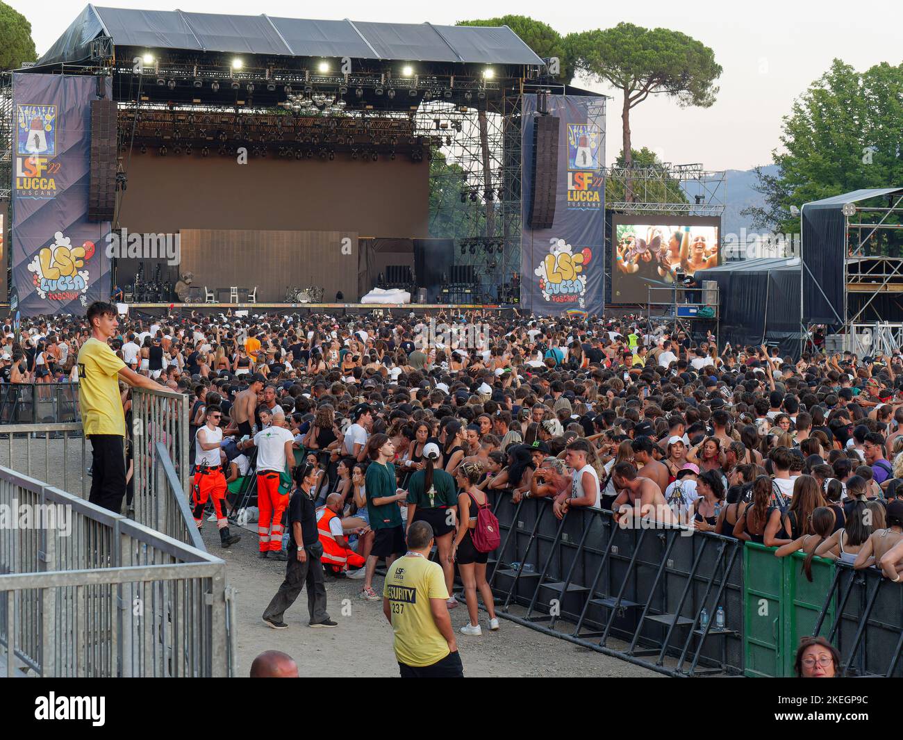 Crowds, hundreds of People, waiting for the Concert to begin and the ...