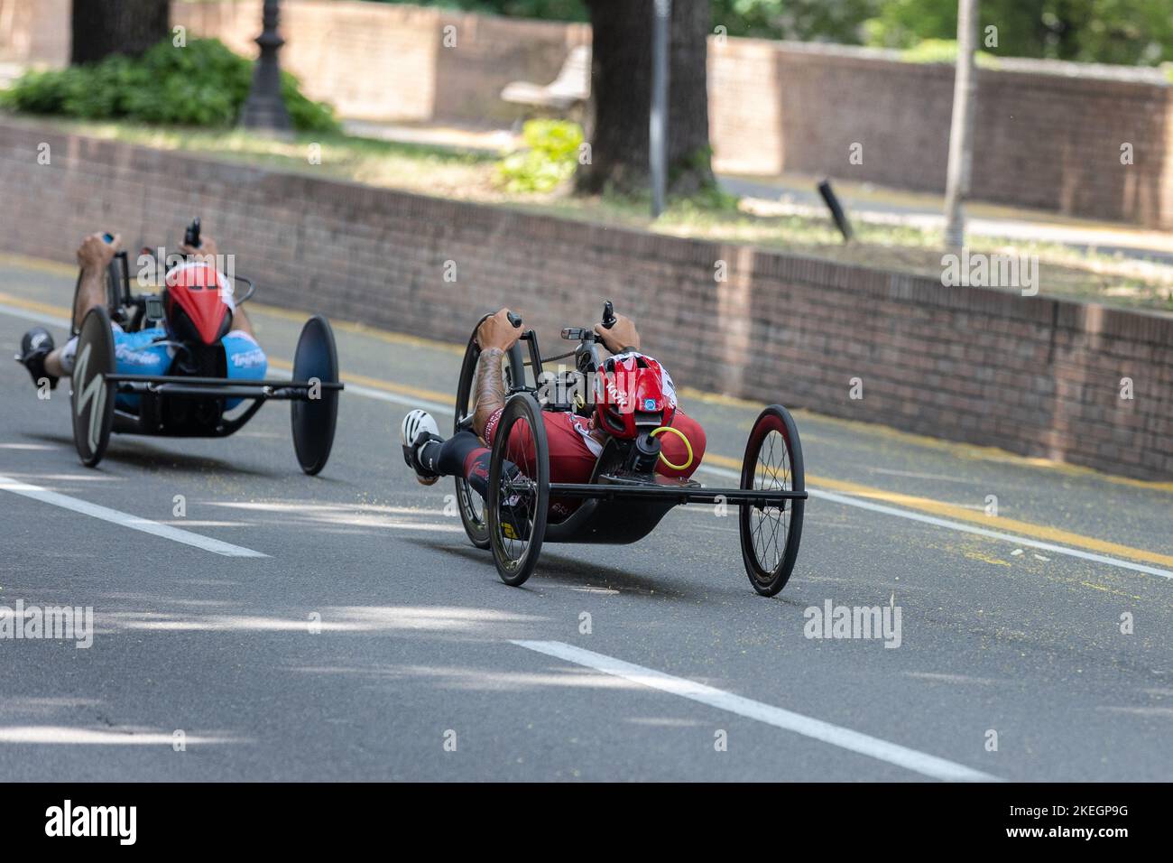 Couple of Athletes training with Their Special Bikes on a City Track ...