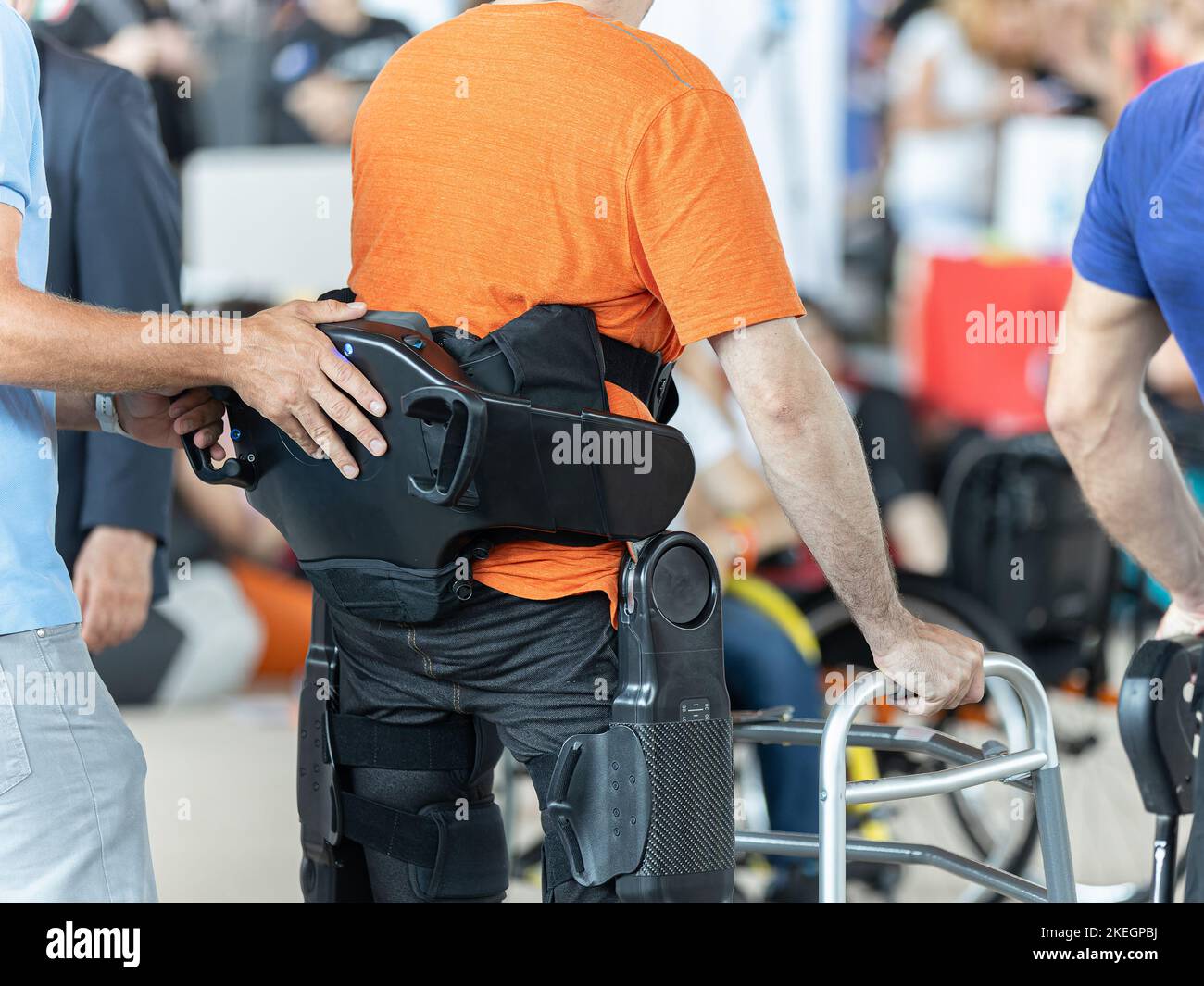 Boy with Mobility Problems in Lower Limbs in Upright Posture Walking ...