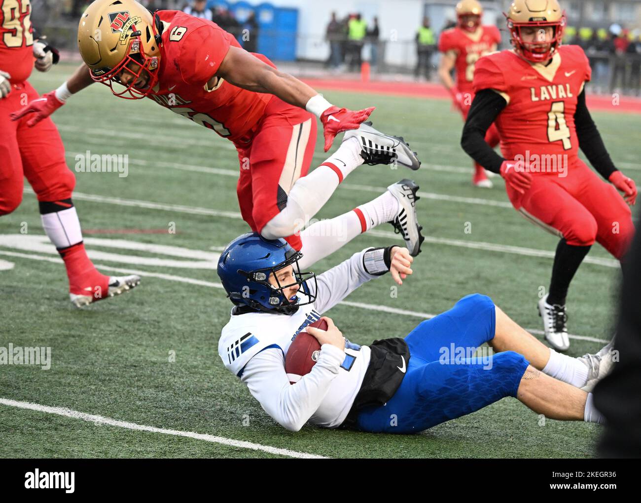 Montreal University Carabins quarterback Jonathan Senecal slides under ...