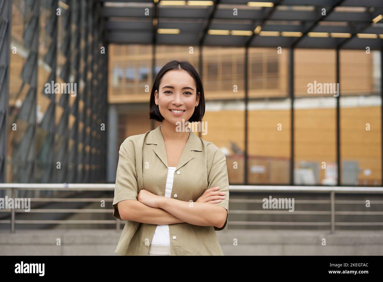 People. Portrait of confident korean girl, young student cross arms on ...