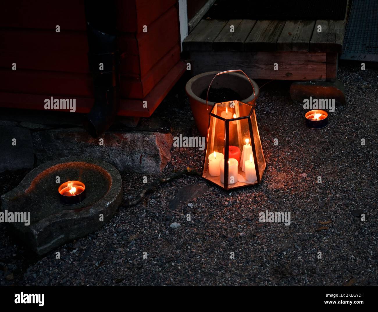 outdoor Christmas candles at the doorstep of a traditional Finnish ...