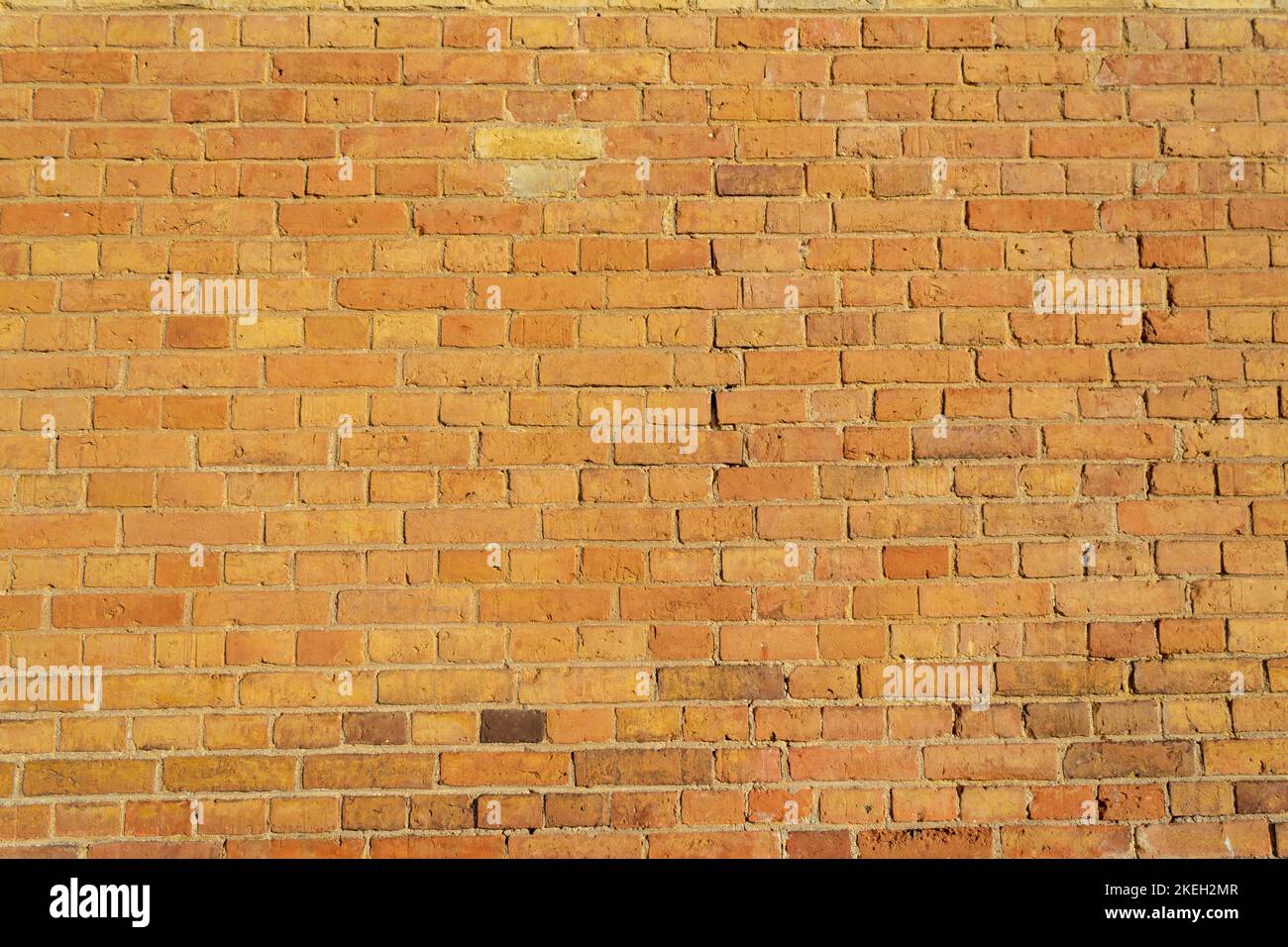 Sand stone wall. sand-colored brick wall Stock Photo - Alamy