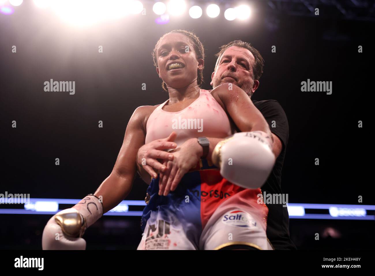 Natasha Jones (left) celebrates victory against Marie-Eve Dicaire in ...