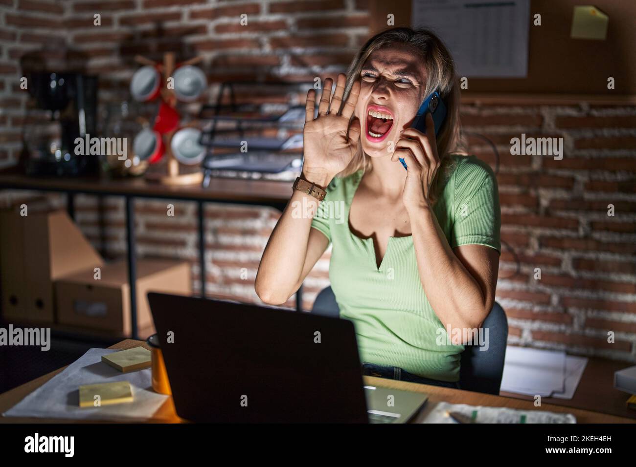 Speaking on phone loud hi-res stock photography and images - Alamy