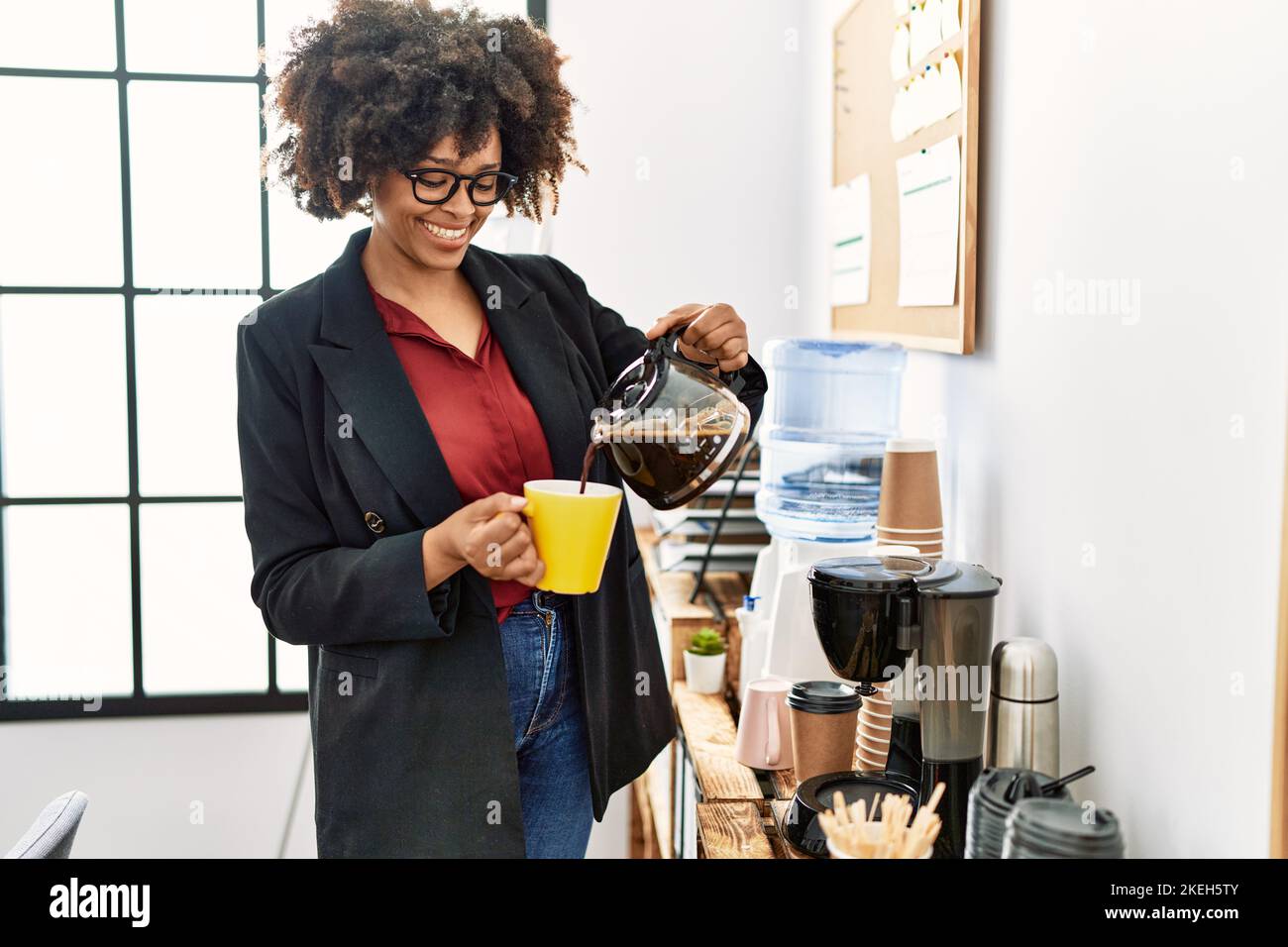 Pouring coffee at work for the boss hi-res stock photography and images ...