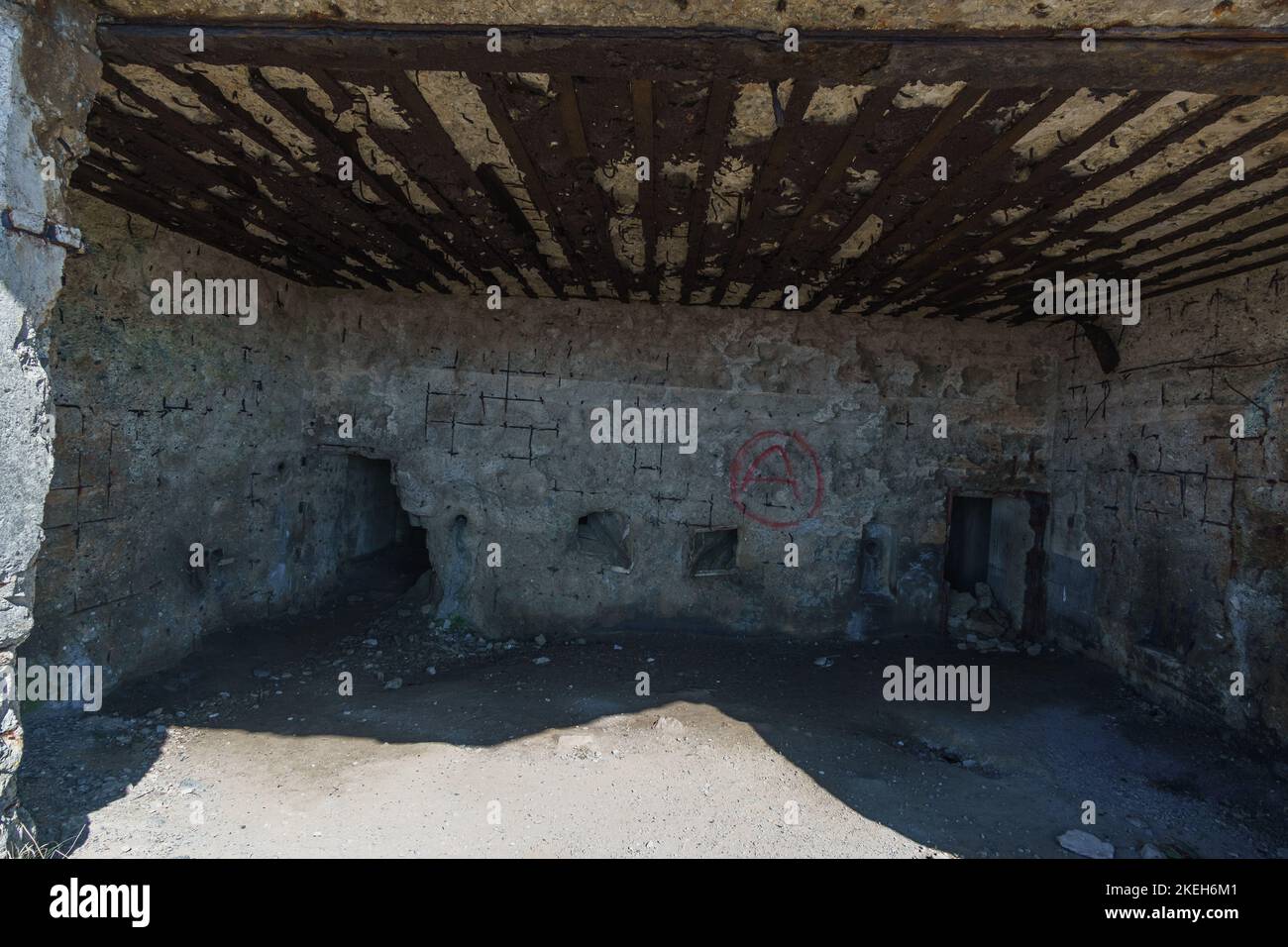 Rusty steel at the ceiling of an old german world war two bunker on the ...