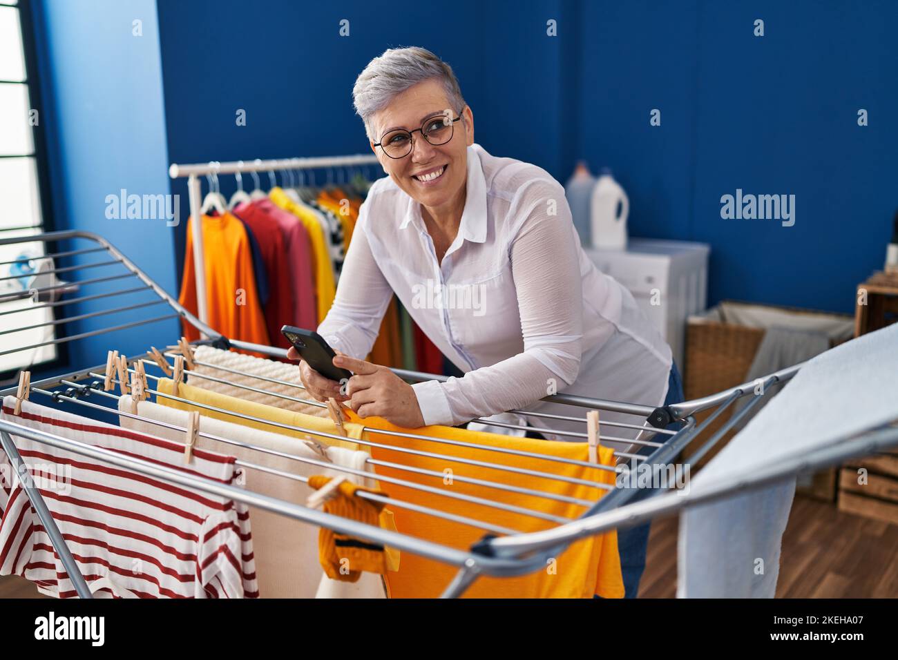 Woman using old washing machine hi-res stock photography and images - Alamy