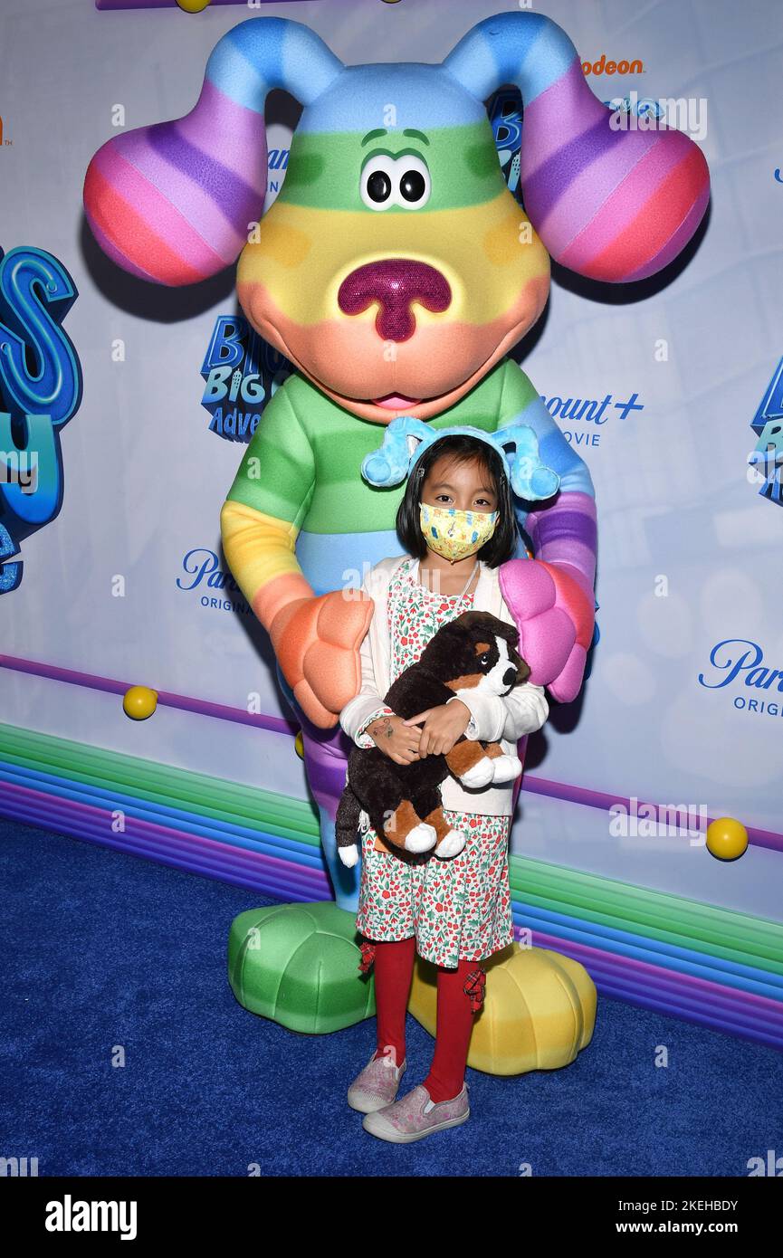 New York, USA. 12th Nov, 2022. Six year-old Adena poses with Rainbow ...