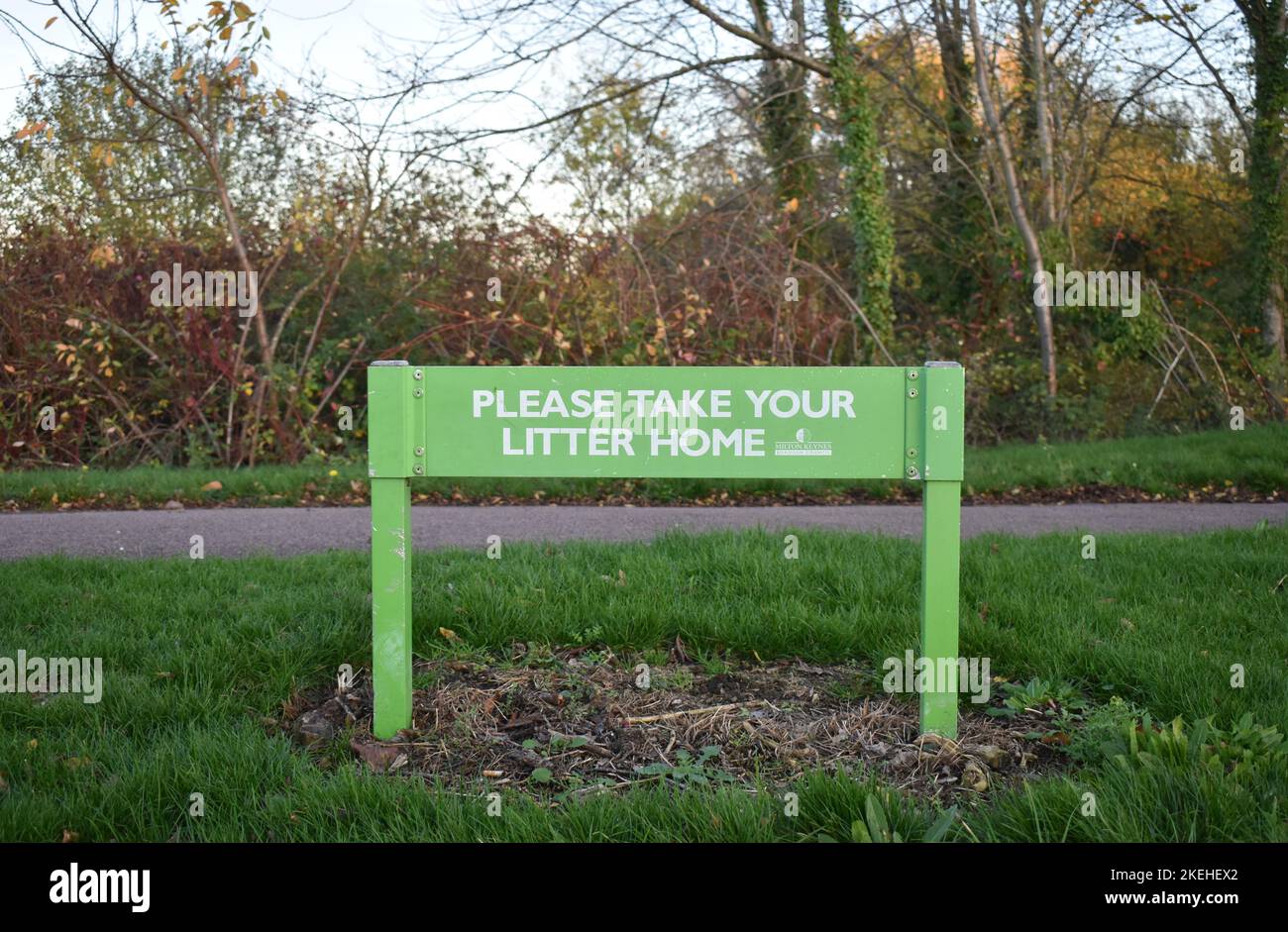 Notice: "Please take your litter home Stock Photo - Alamy