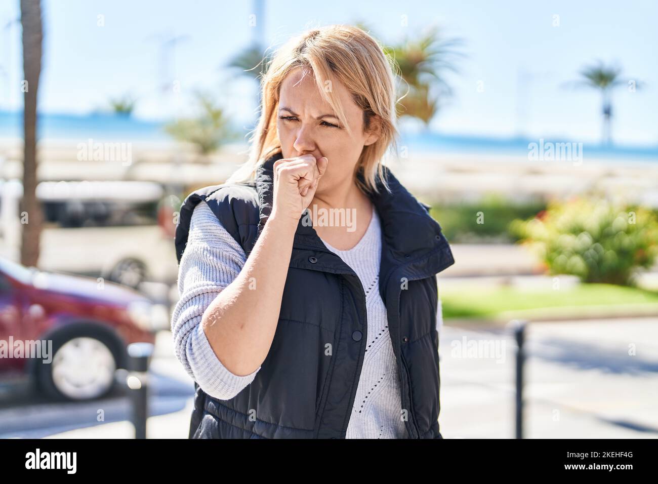 Outdoor portrait young woman coughing hi-res stock photography and ...