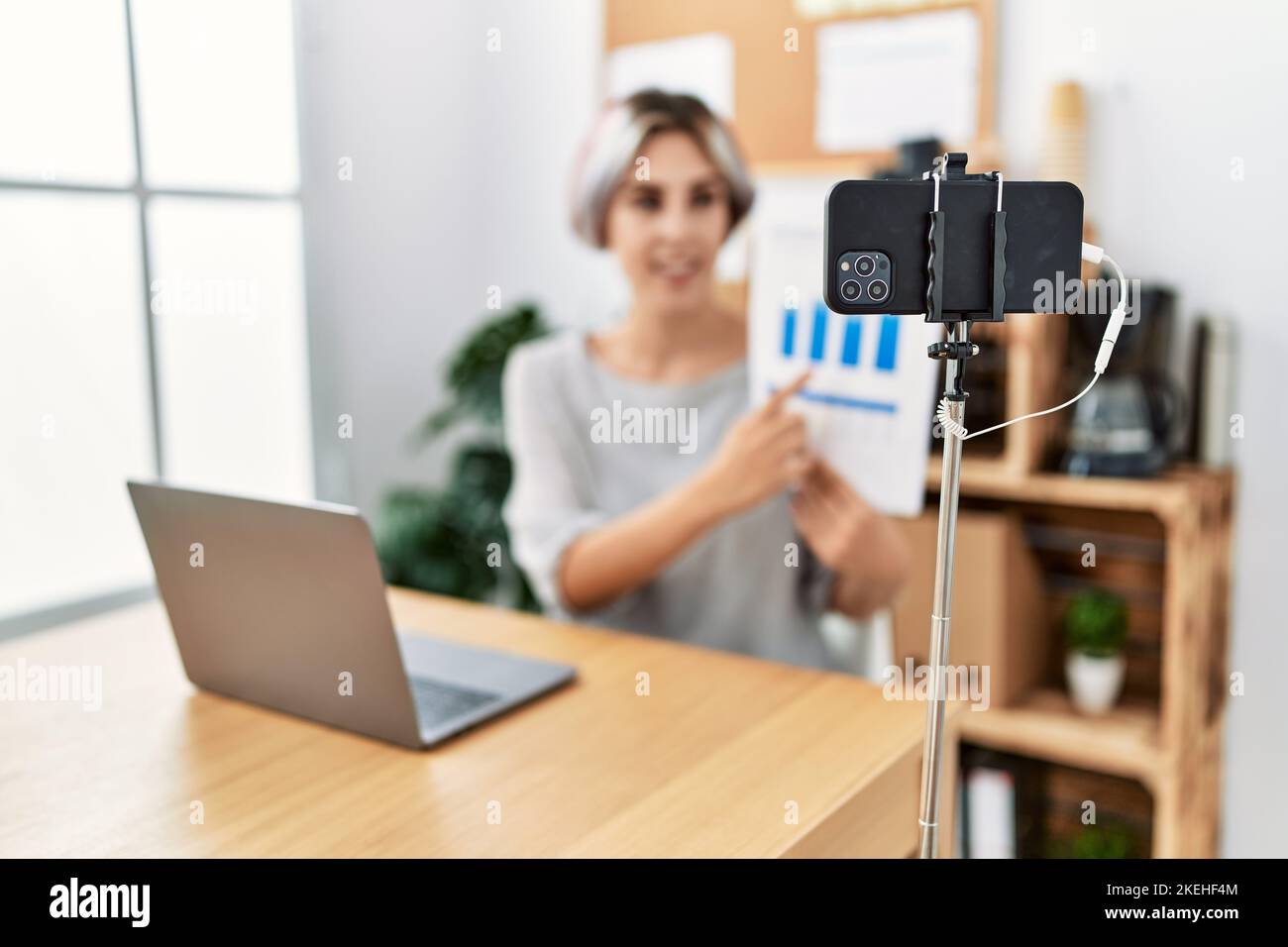 Young caucasian businesswoman smiling happy having video call at the ...