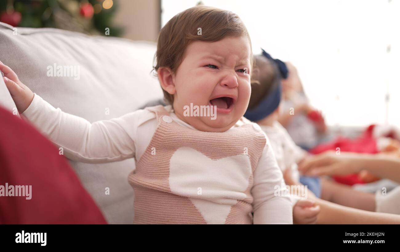 Child crying christmas tree hi-res stock photography and images - Alamy