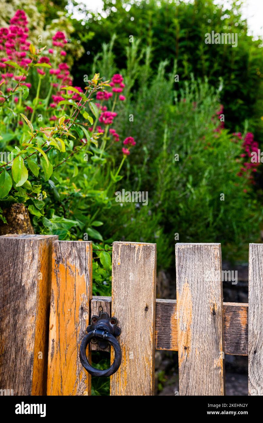 English garden gate welcomes in the Cotswolds village of Broadway Stock ...