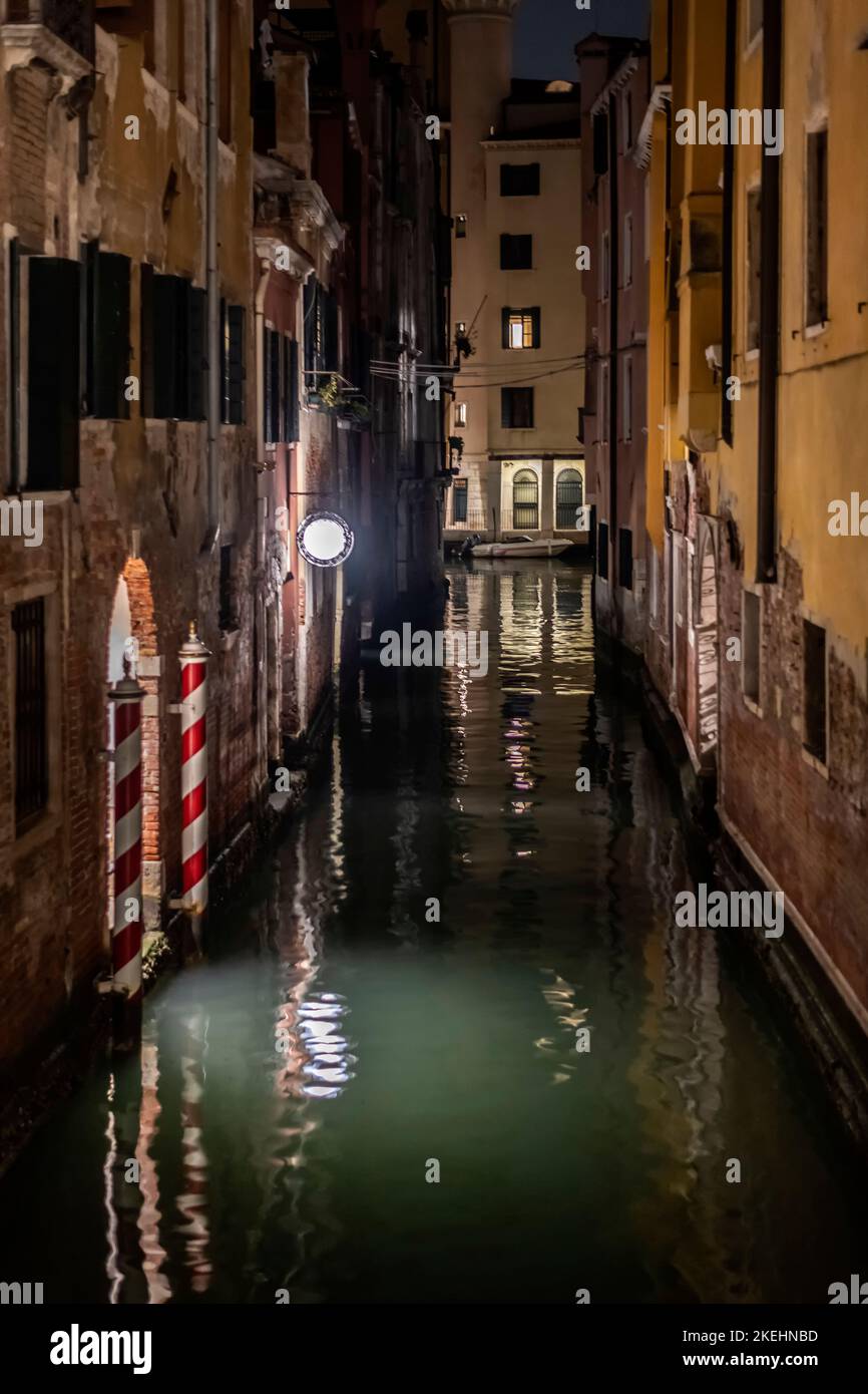 Narrow Venetian canal at night Stock Photo - Alamy