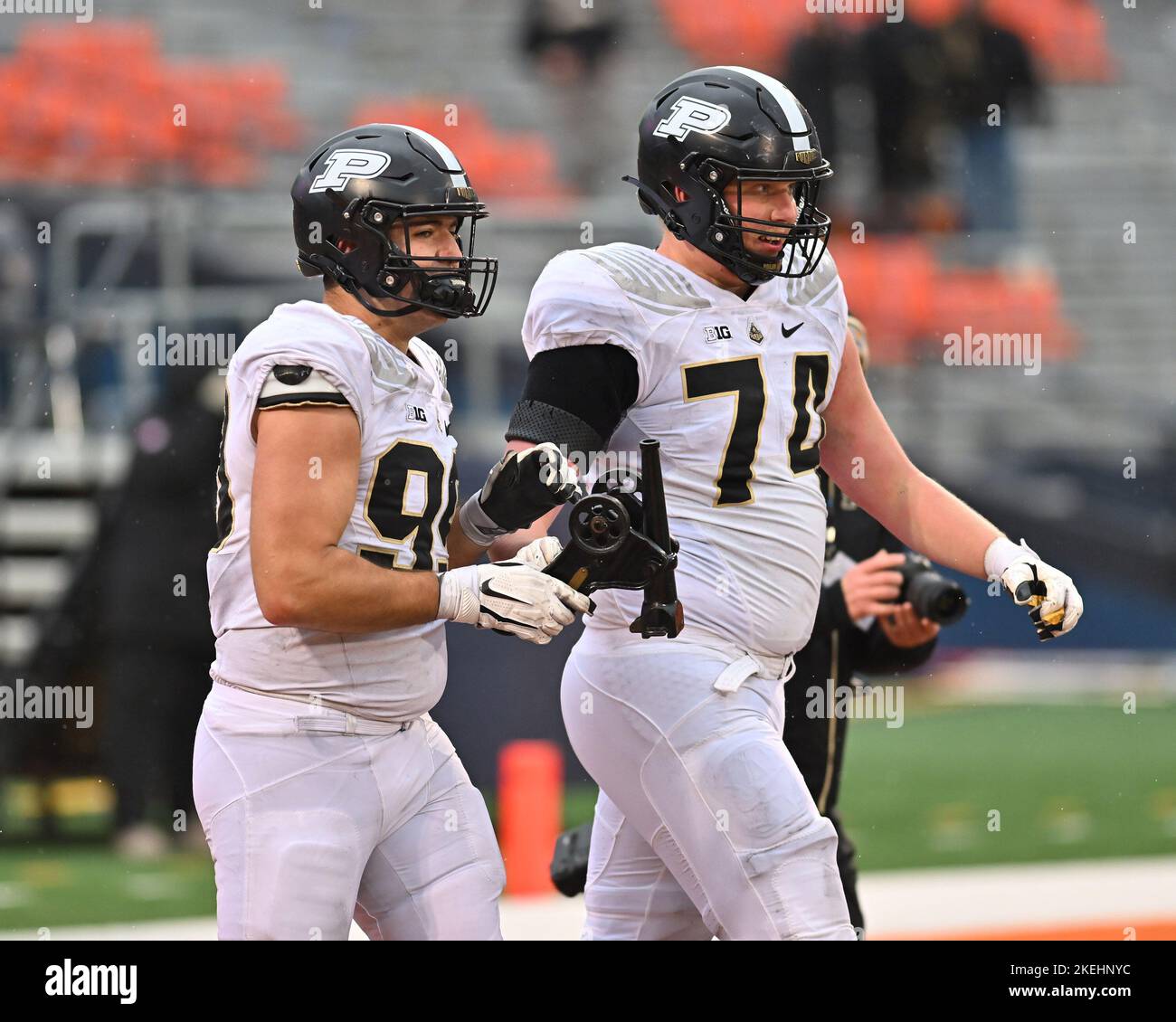 November 12, 2022: Purdue Boilermakers offensive lineman Eric Miller (74) and a teammate carry ...