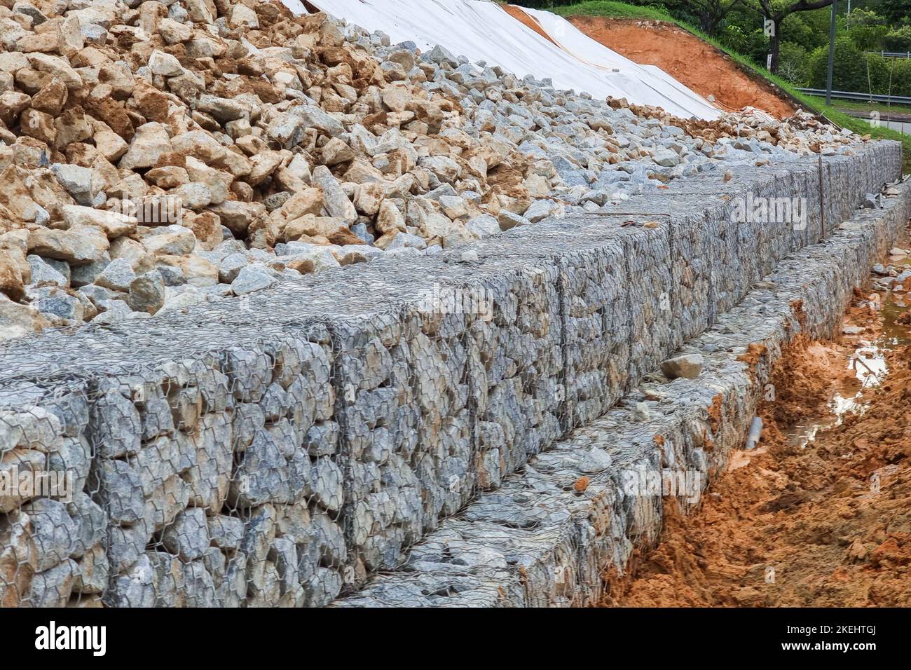 Series of close-up slope retention construction design with rocks and ...