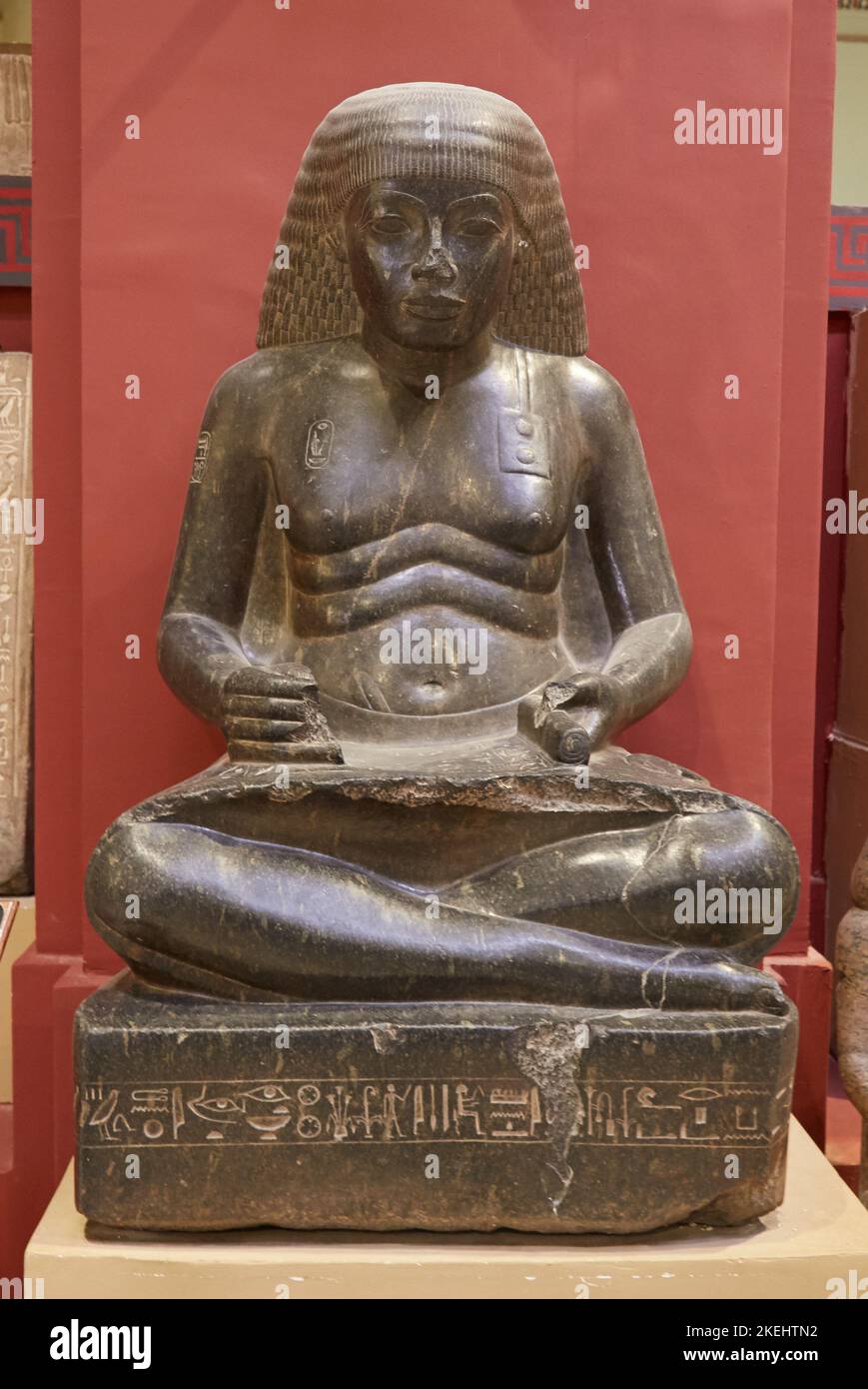 A Statue of a Scribe at the Egyptian Museum Stock Photo - Alamy