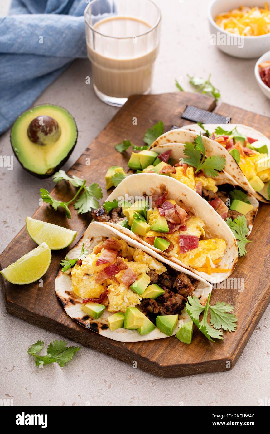 Breakfast tacos with sausage, eggs, bacon and avocado Stock Photo - Alamy