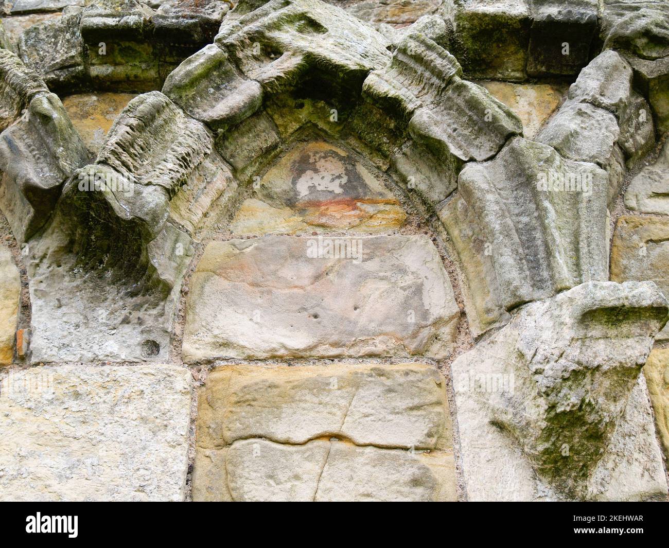 Old stone medieval building exterior detail arch shape Stock Photo - Alamy
