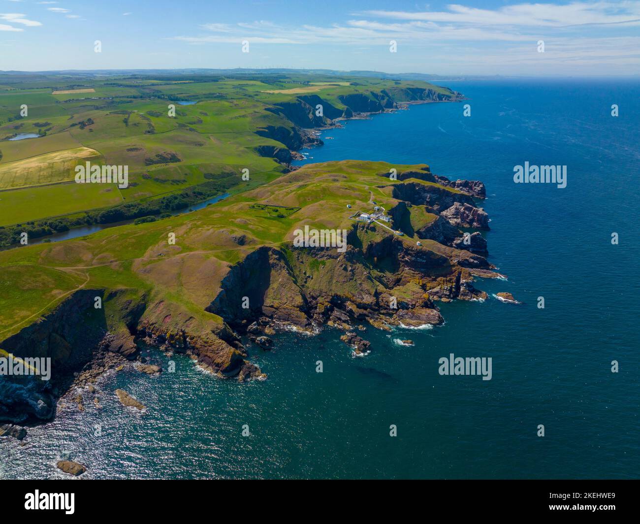 St. Abbs Lighthouse and coastal cliffs aerial view in summer near ...